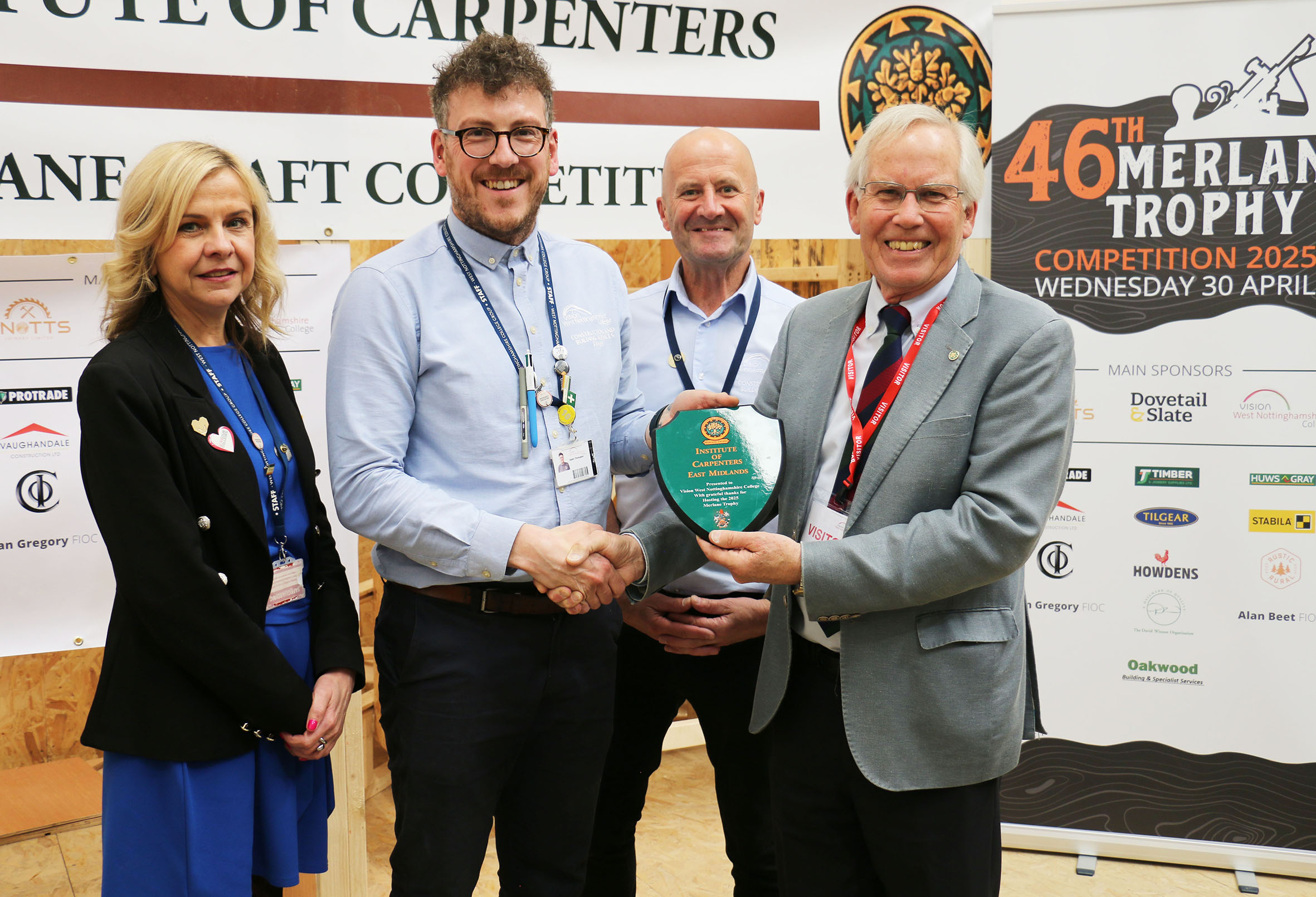 The Institute of Carpenters’ president Geoff Rhodes presents the trophy ...